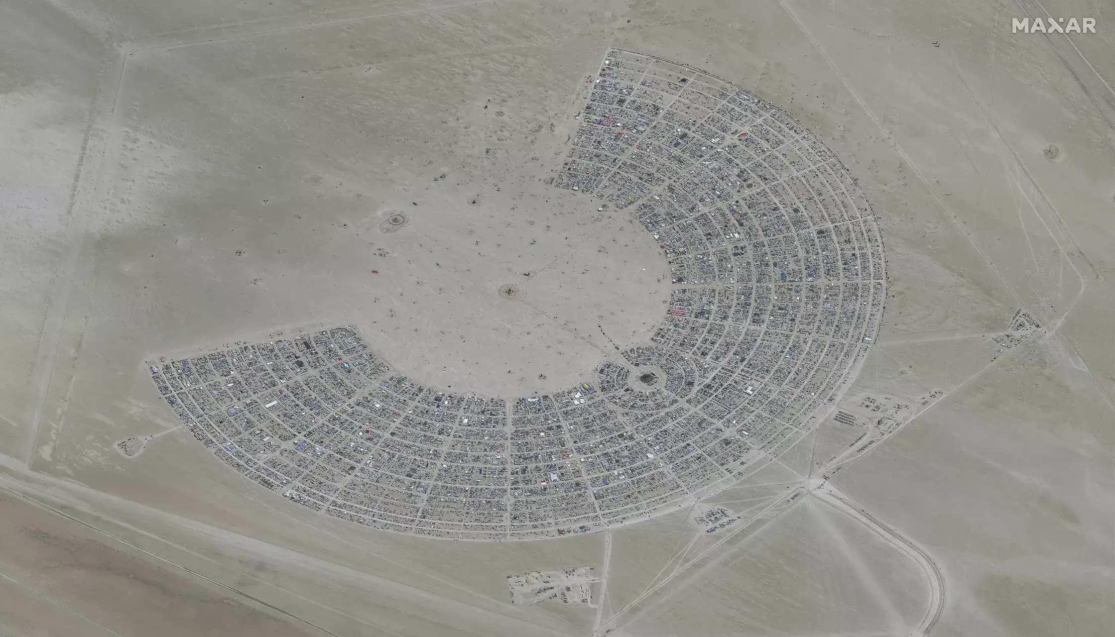 Burning Man Festival: Burning Man festival in Nevada mired in mud after ...