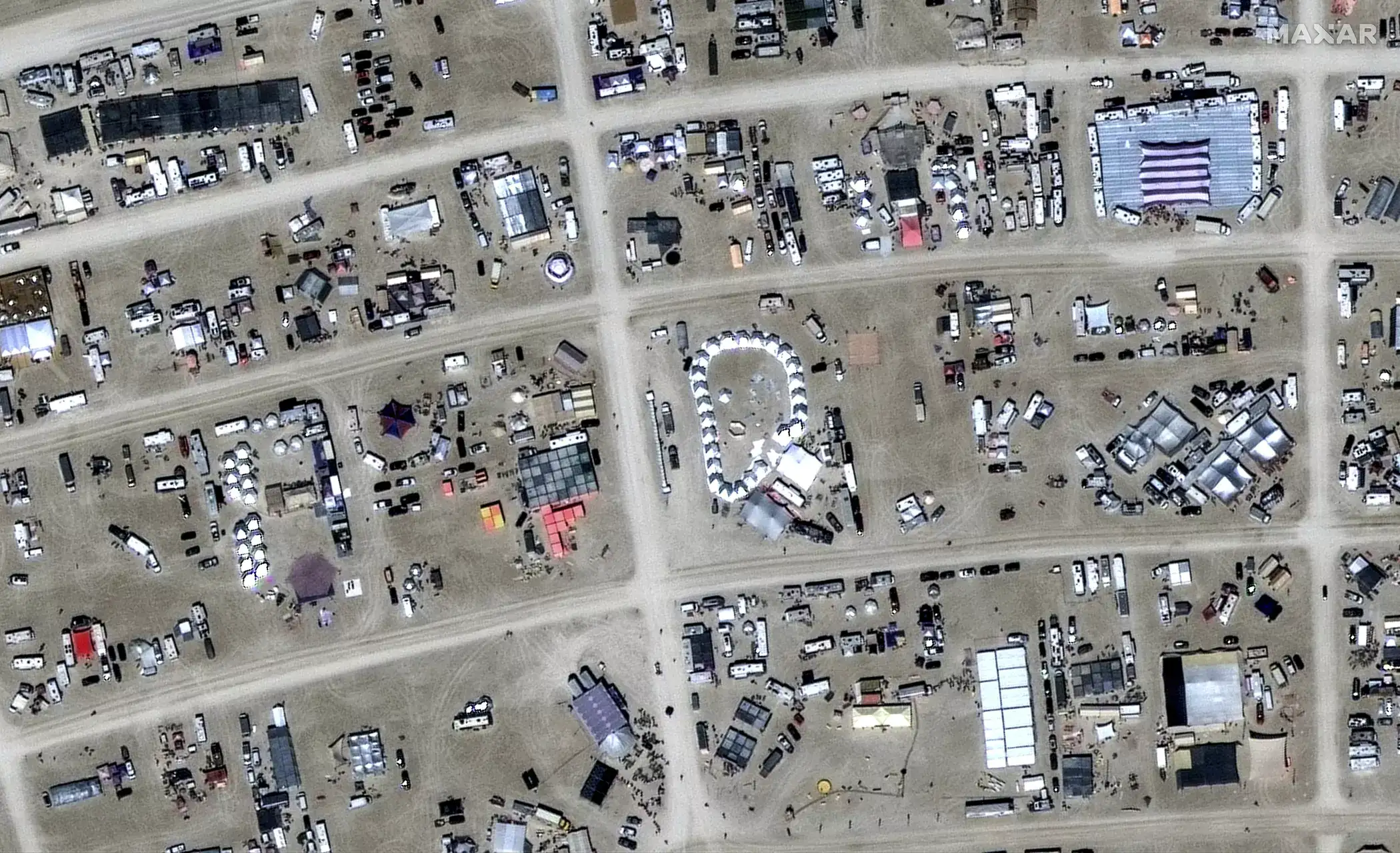 Burning Man Festival: Burning Man festival in Nevada mired in mud after ...