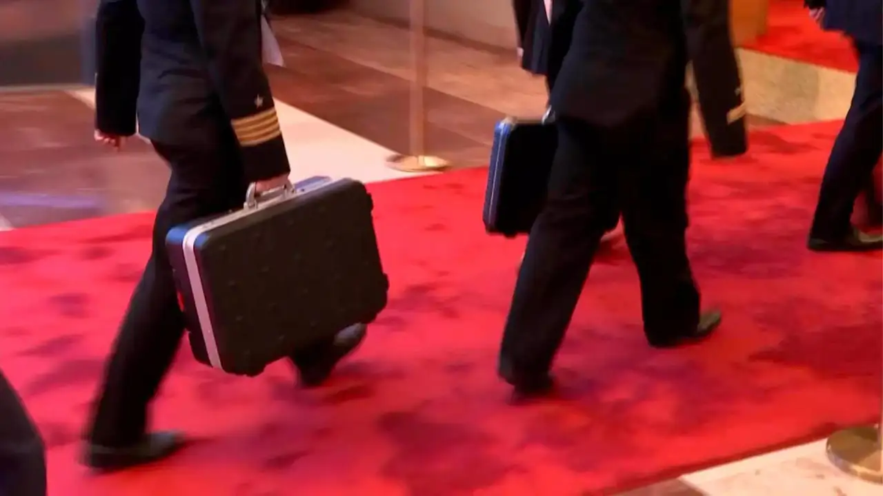 putin nuclear briefcase: Putin seen in China with the Nuclear Briefcase ...