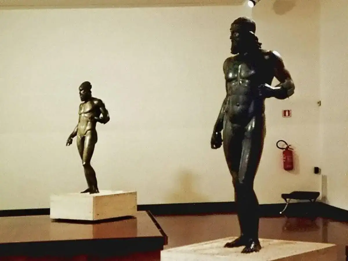 In 1972, a diver off Italy noticed a human arm rising from the sand ...