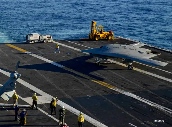 US Navy's X-47B: World's first unmanned robot aircraft piloted by ...