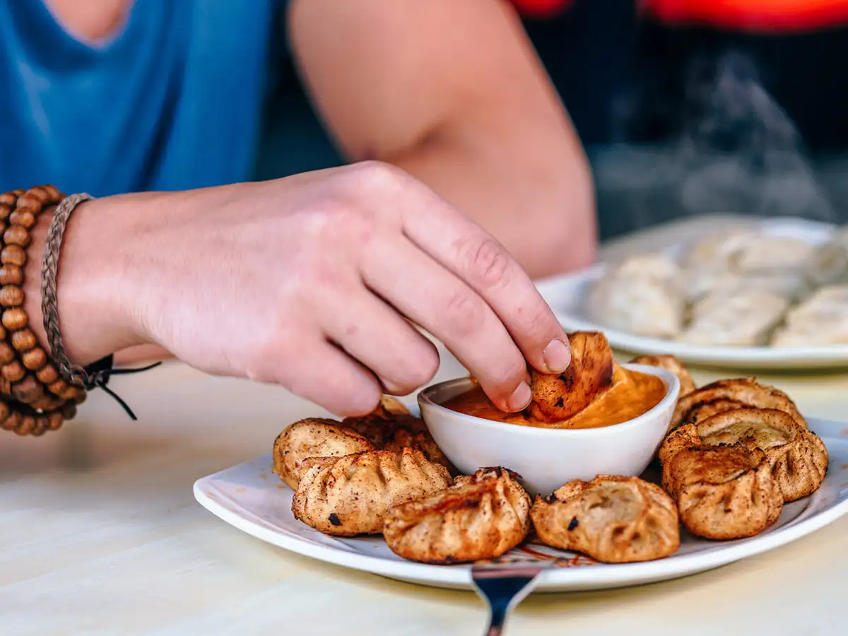 momos: With a dash of curry spices & tandoori mayonnaise on the side ...