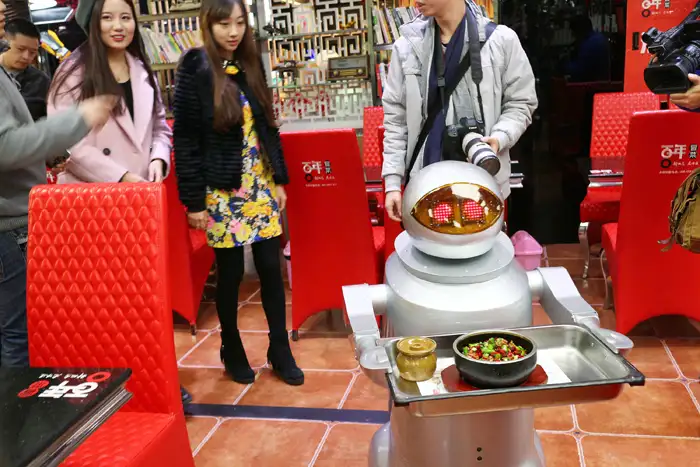 Robot: In post-Covid world, robot waiters to greet and serve you at ...
