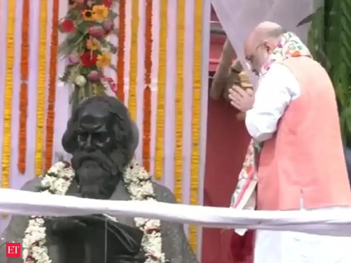 Watch: Amit Shah visits ancestral house of Rabindranath Tagore, offers ...