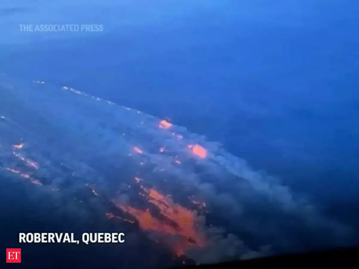 Canada: Thousands in Quebec evacuated from wildfires - The Economic ...
