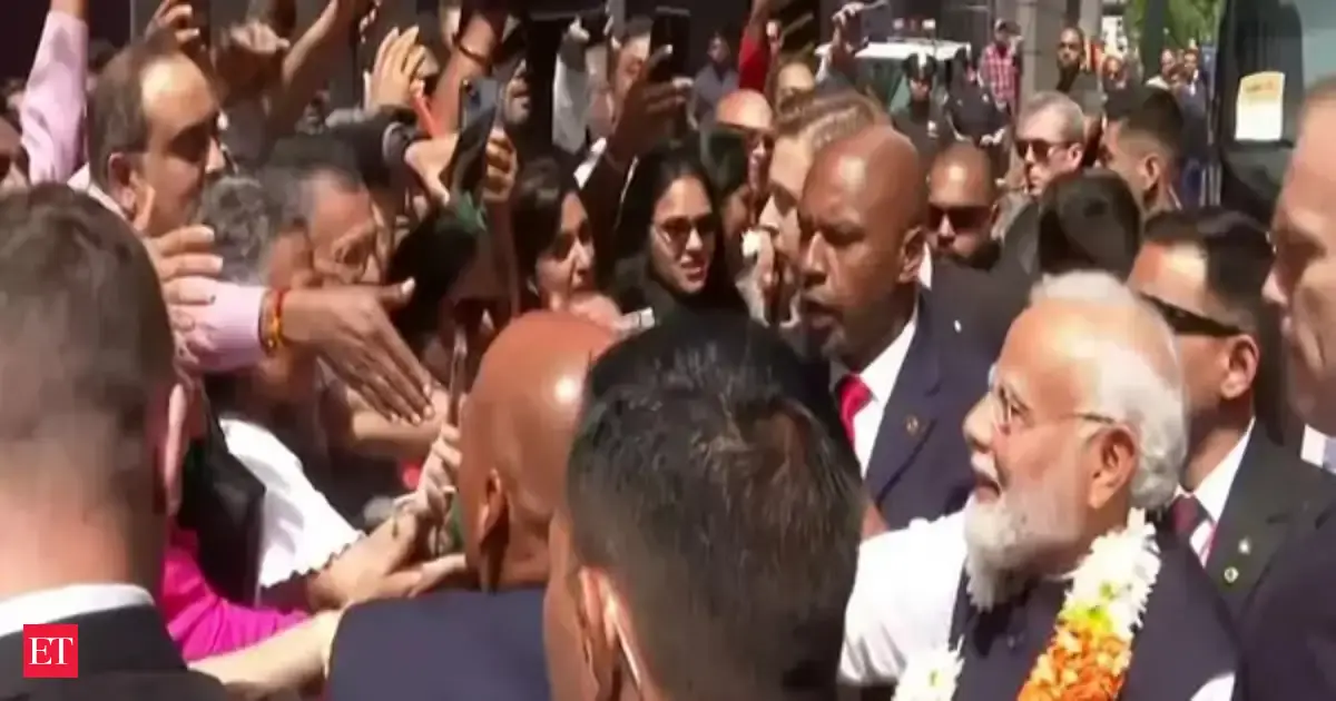 PM Narendra Modi meets people outside hotel in New York - The Economic ...
