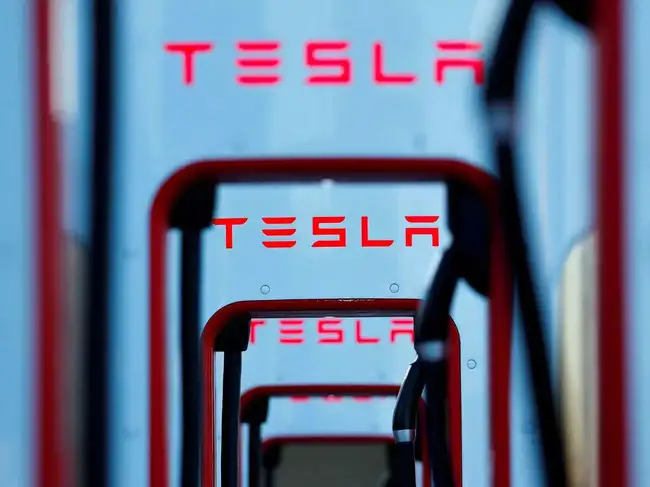 tesla layoffs: Tesla starts to lay off some workers at China factory ...