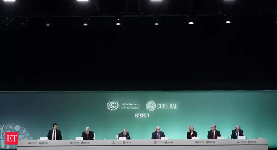 energy systems: New COP28 draft text does not mention phase out of fossil fuels - The Economic Times