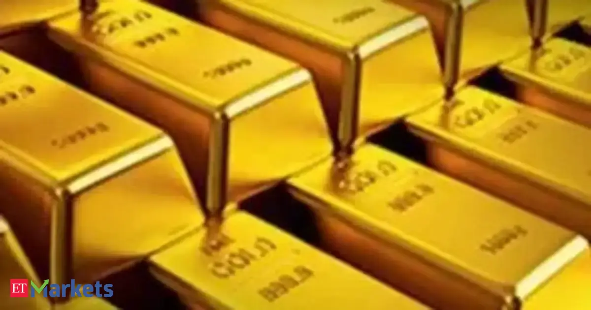Gold prices hit record highs on safe-haven demand - The Economic Times
