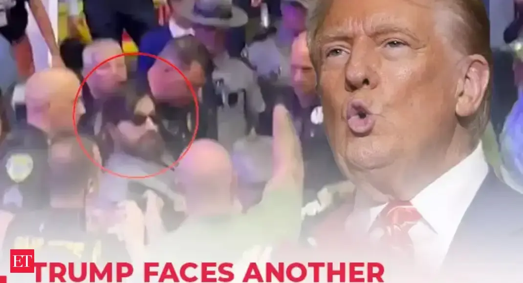 Donald Trump: Trump faces another security threat: Man scales barrier, tries to storm stage in ...