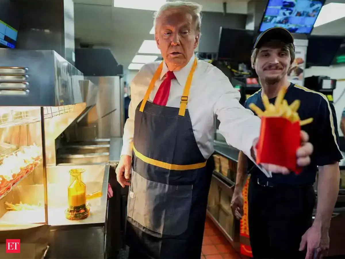 Donald Trump turns chef at McDonald's, mocks Kamala Harris's fast-food ...