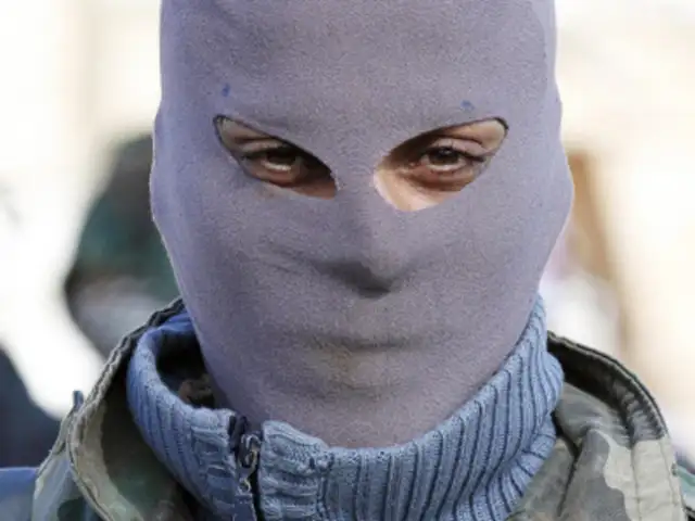 A masked Syrian rebel - February 10, 2012 | The Economic Times