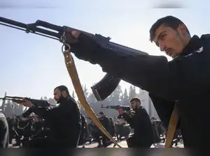 New Syria leader vows state 'monopoly' on weapons - The Economic Times