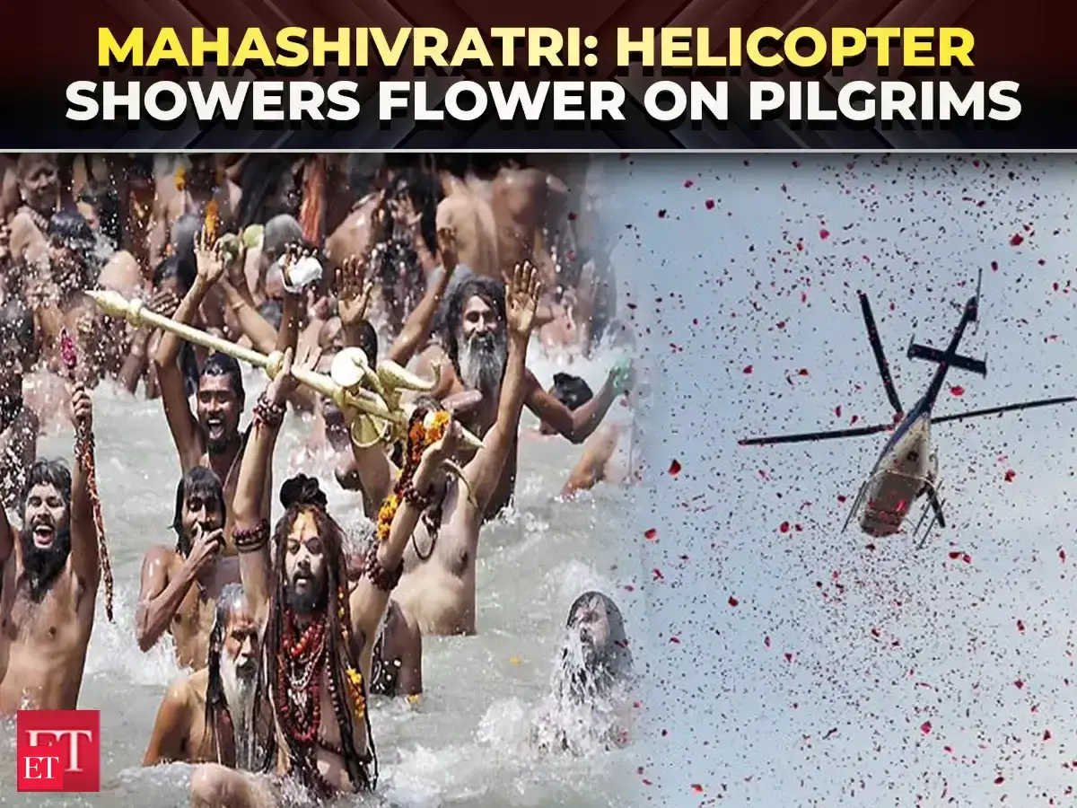 Mahashivratri: Helicopter showers flower petals on pilgrims taking holy ...