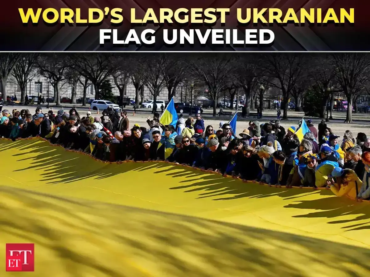 ‘Make Russia pay’: Protesters unveil world’s largest Ukrainian flag ...
