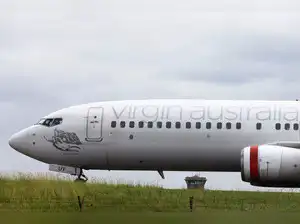 Virgin plane collides with ground vehicle at Melbourne airport during ...
