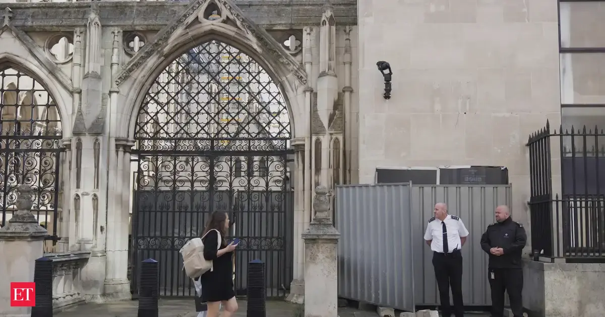New Banksy mural of judge beating a protester outside London court ...