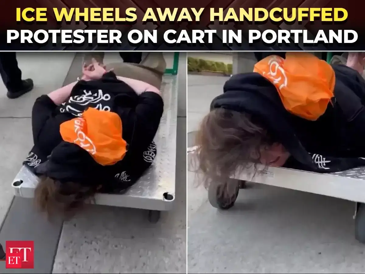 ICE takes away handcuffed Portland protester on a cart, video goes ...