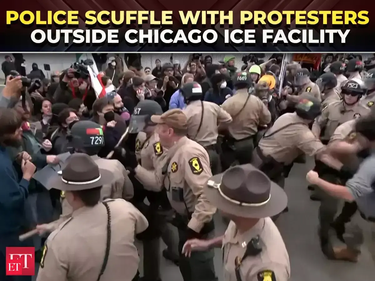 Police scuffle with protesters outside Chicago ICE facility, arrest ...