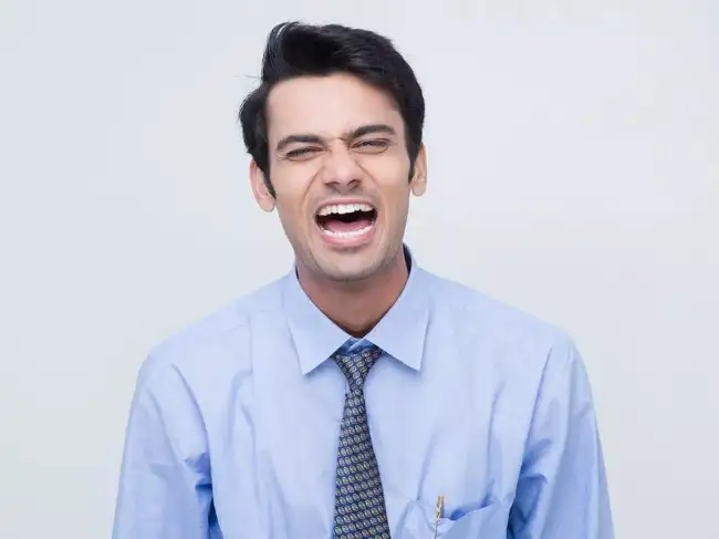 All he did was smile on boss's joke and almost ended up being fired ...