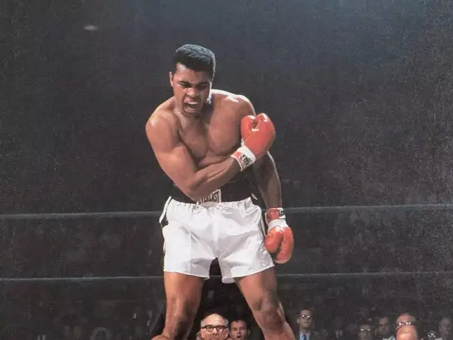 Quote of the day by Muhammad Ali: 'A man who views the world the same ...