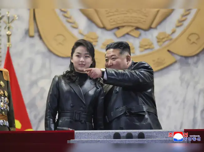 Kim Jong Un: Succession signals? Matching coats of Kim Jong Un and ...