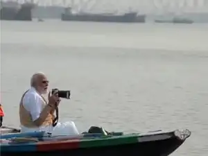 PM Modi takes boat ride on Hooghly river in Kolkata, says committed to ...