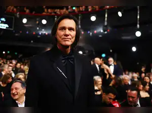 jim carrey: Quote of the day by Jim Carrey: 'Behind every great man is ...