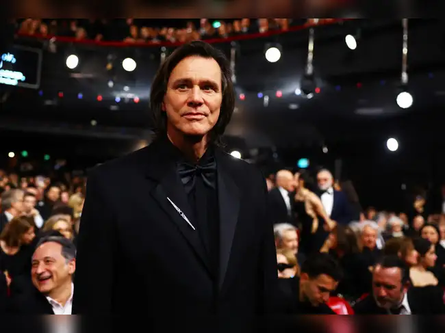 jim carrey: Quote of the day by Jim Carrey: 'Behind every great man is ...