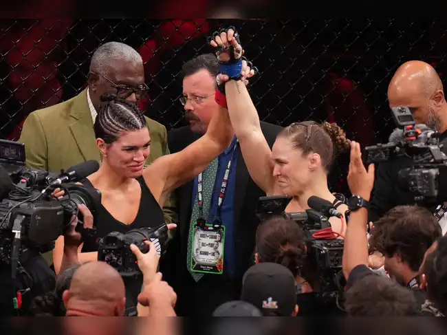 Watch Ronda Rousey And Gina Carano Share Emotional Hug As They Fight