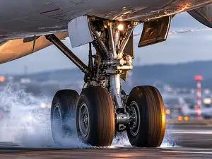 The century-old secret of how airplane tires survive the full force of ...