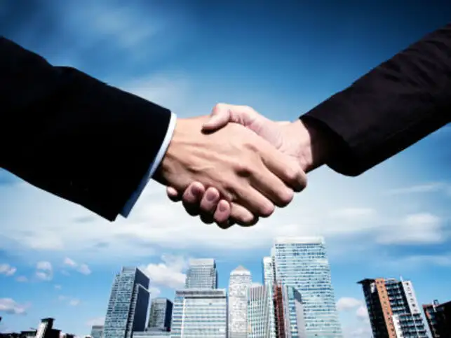 Tips to master the handshake - The Economic Times