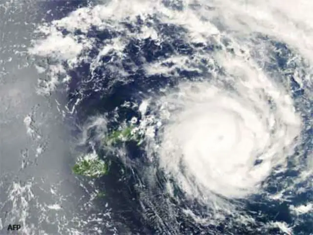 One dead, widespread destruction in Tonga cyclone - One dead ...