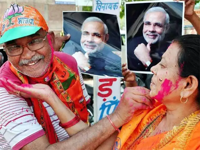 May 16, 2014 - BJP party workers celebrate in Chandigarh | The Economic ...