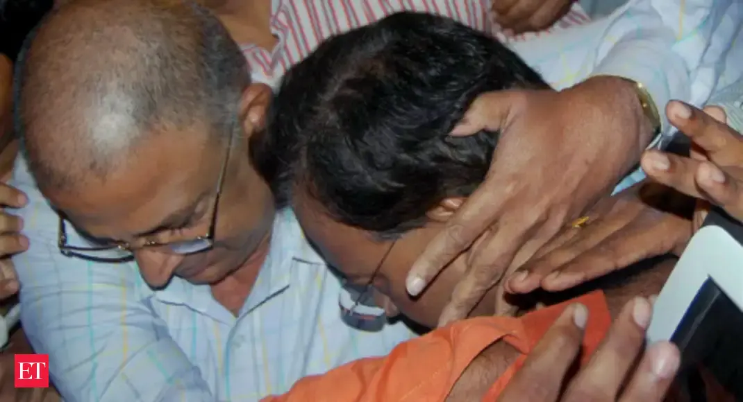 Ramalinga Raju's surrender - | The Economic Times