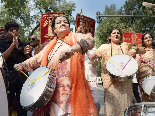 BJP supporters celebrating the party's victory - BJP celebrates the ...
