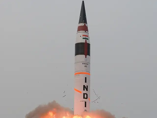 Mounted on a road-mobile launcher - Agni-V missile's maiden canister ...