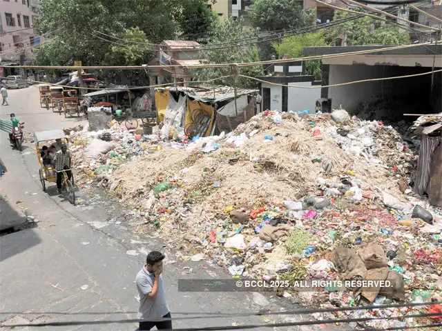 Adding woes to traffic - Delhi's garbage mess rings alarm bell for ...