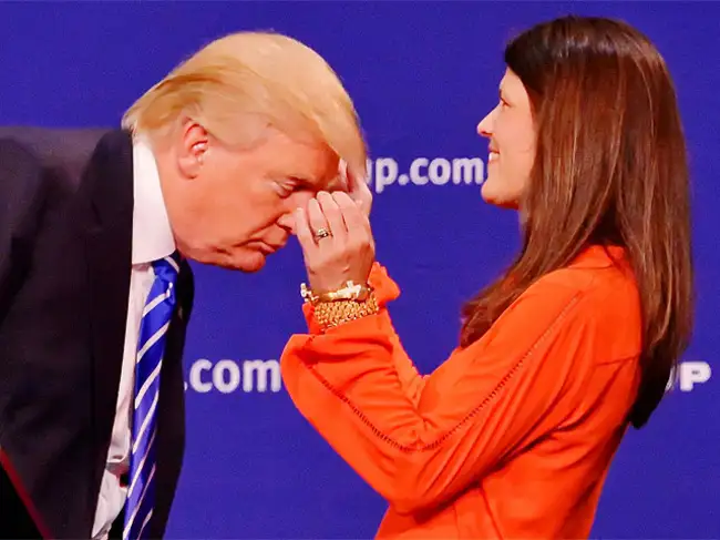 Donald Trump proves his famed hairdo is no toupee! - The Economic Times