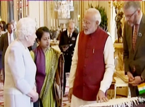 PM Narendra Modi presents Queen Elizabeth II pictures from her 1961 ...