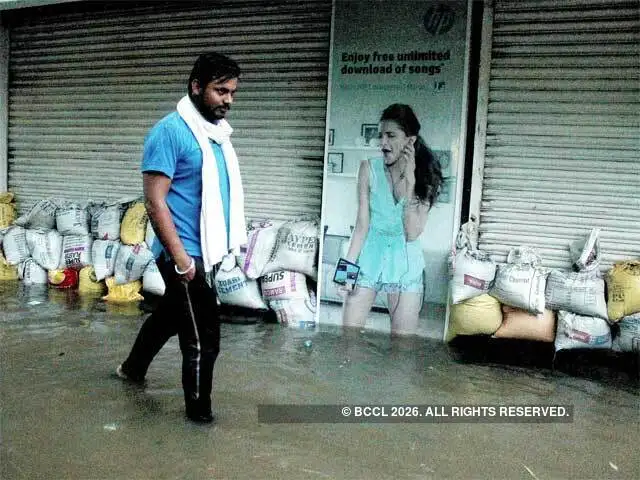Man tries to move to a safer place - Chennai's worst rain in 100 years ...