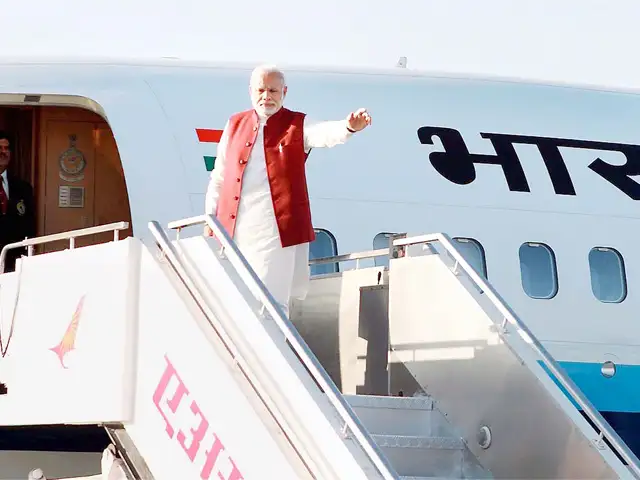 PM with a cultural troupe - Choicest pics: PM Narendra Modi attends DGP ...