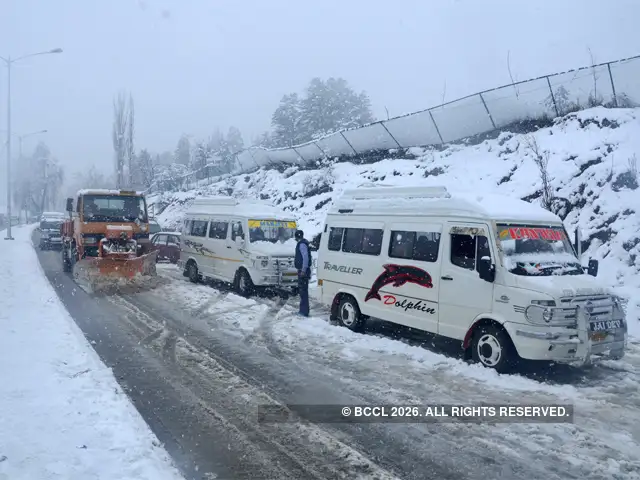 People braving the snow - Choicest pics: Fresh snowfall in Kashmir's ...