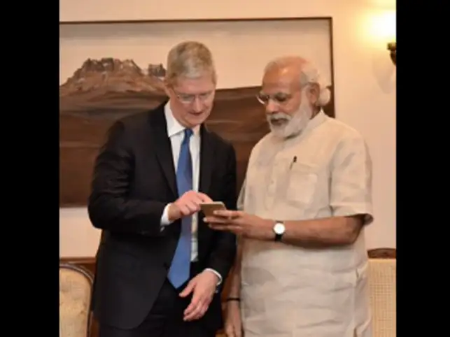 Tim Cook: PM Modi gets an Apple update, courtesy Tim Cook - The ...