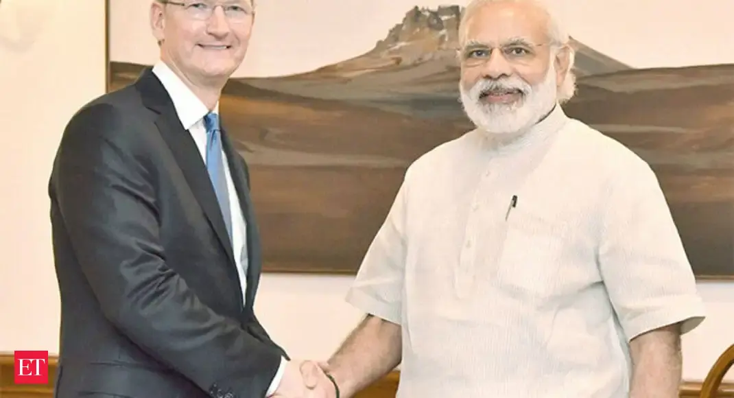 Tim Cook meets PM, updates 'Narendra Modi' app - Tim Cook meets PM ...