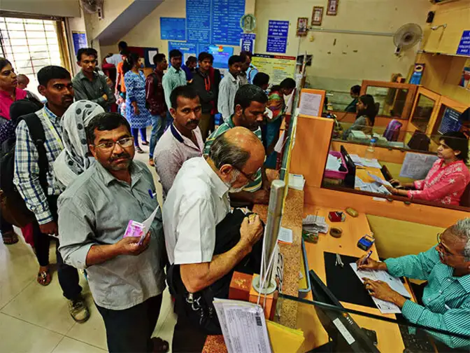 Long queue outside ATMs; line for bank withdrawal eases up - The ...