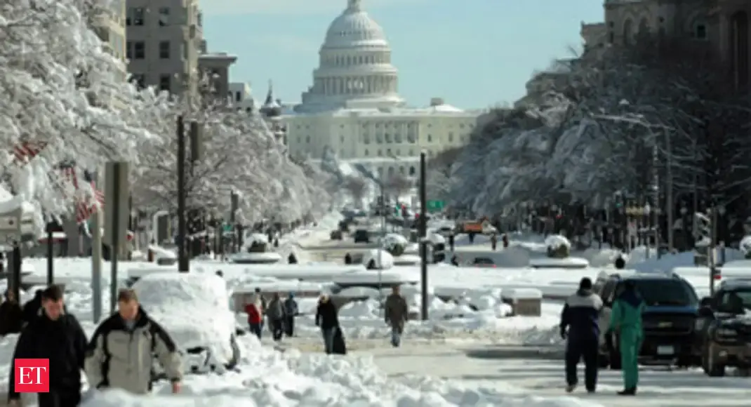 Washington DC slowly digs out after snowstorm - | The Economic Times