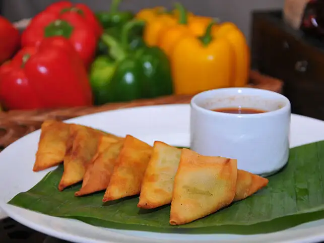 Rainy-day indulgence: A quick, no-fuss masala onion patti samosa recipe ...