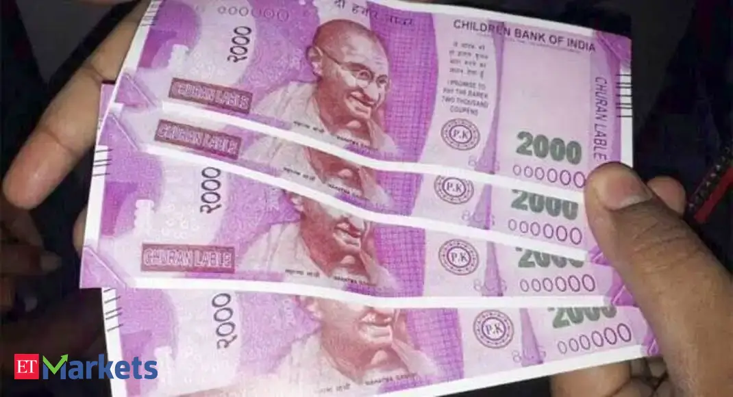 Rupee could hit a high of 62 or even less: ET Poll - The Economic Times