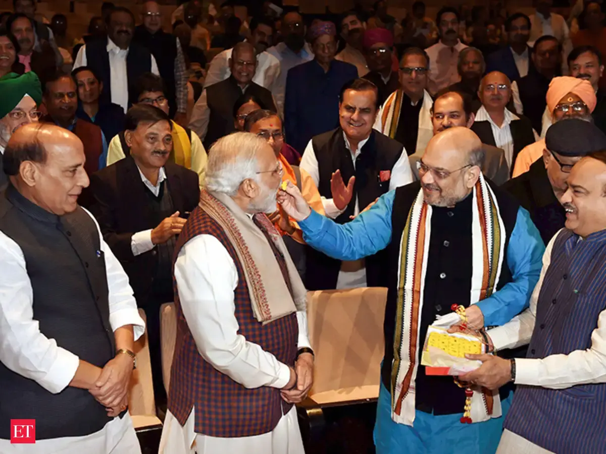 Modi: BJP's twin victory: PM Modi gets rousing welcome in parliamentary ...